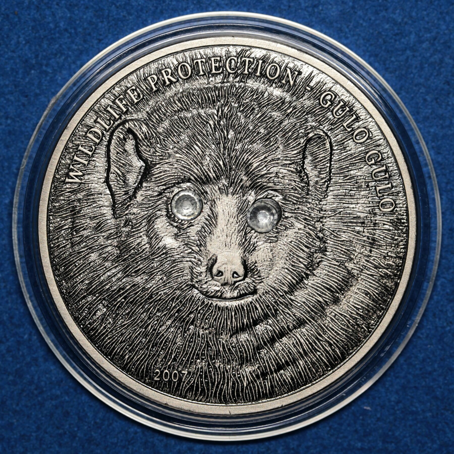 Монета 500 тугриков 2007 Росомаха Монголия Фауна Цветные глаза. Копия монеты