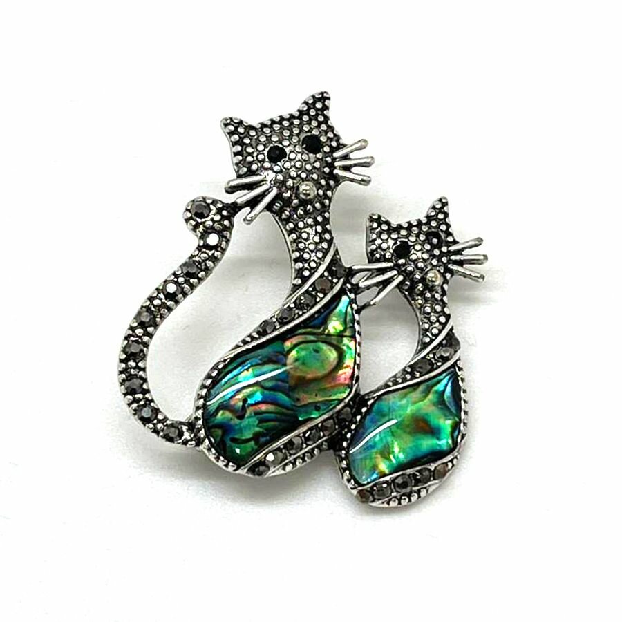 Брошь, гелиотис