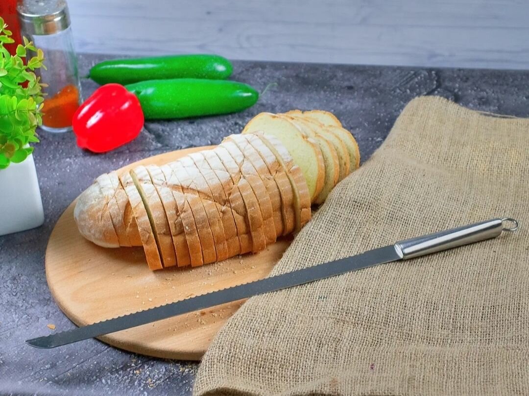 Нож для бисквита, хлеба лезвие 35см крупные зубцы.