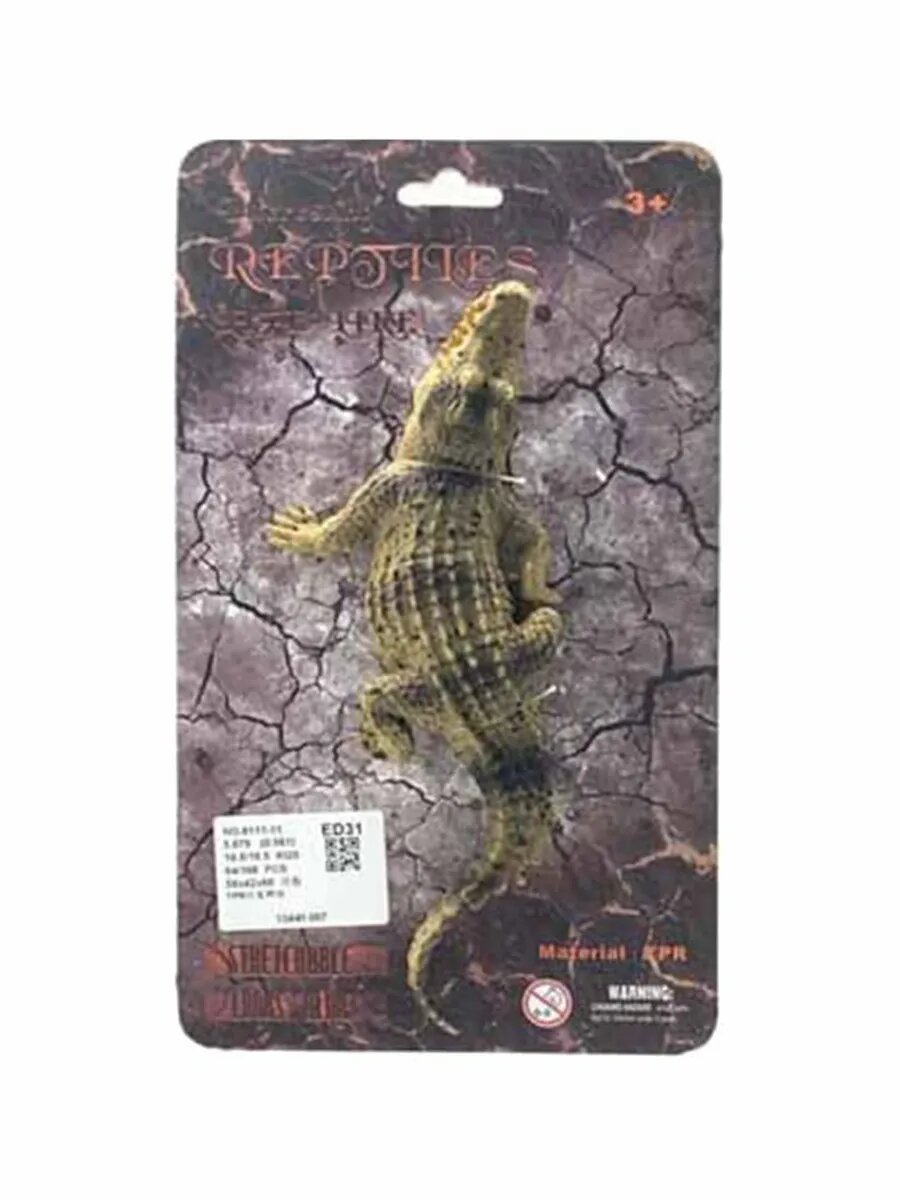 Игрушка изображающая рептилию: крокодил