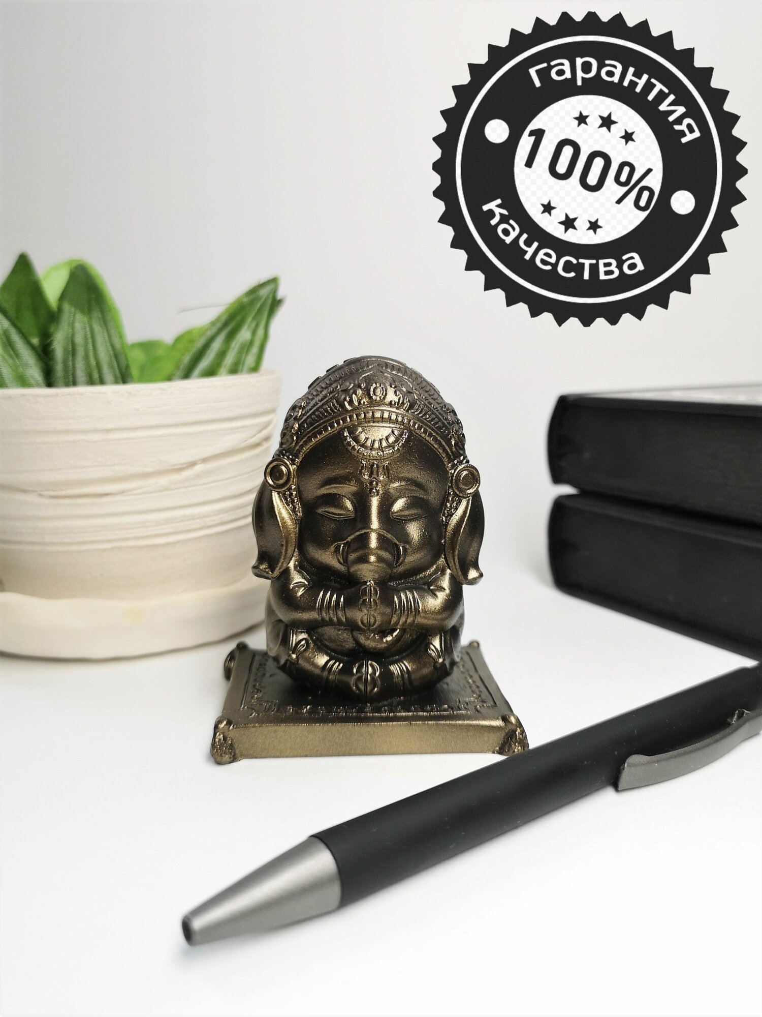 Статуэтка Ганеша на ковре бронзовый. Гипс. Высота 7 см.