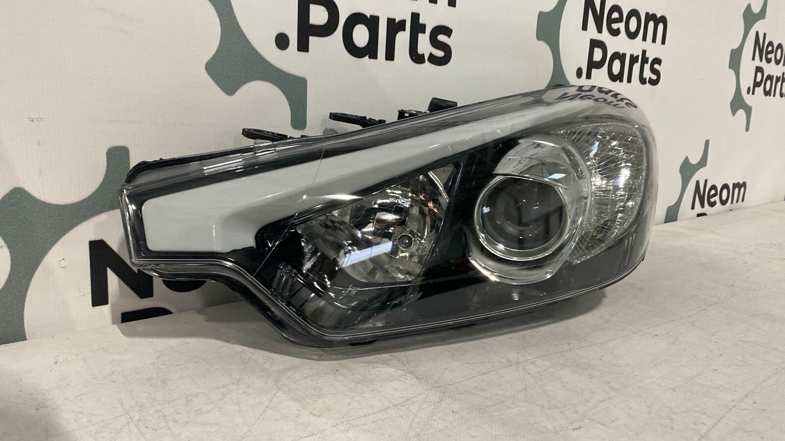 Фара левая Kia Cerato 3 YD 13-16