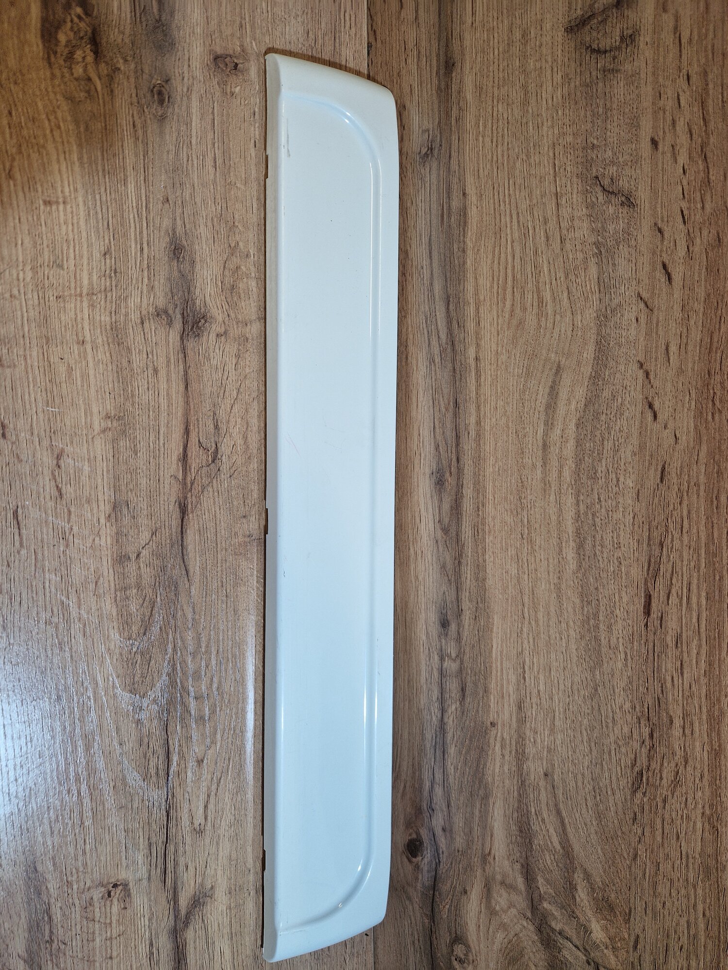 Нижняя цокольная пластиковая панель для стиральной машины Indesit W105X