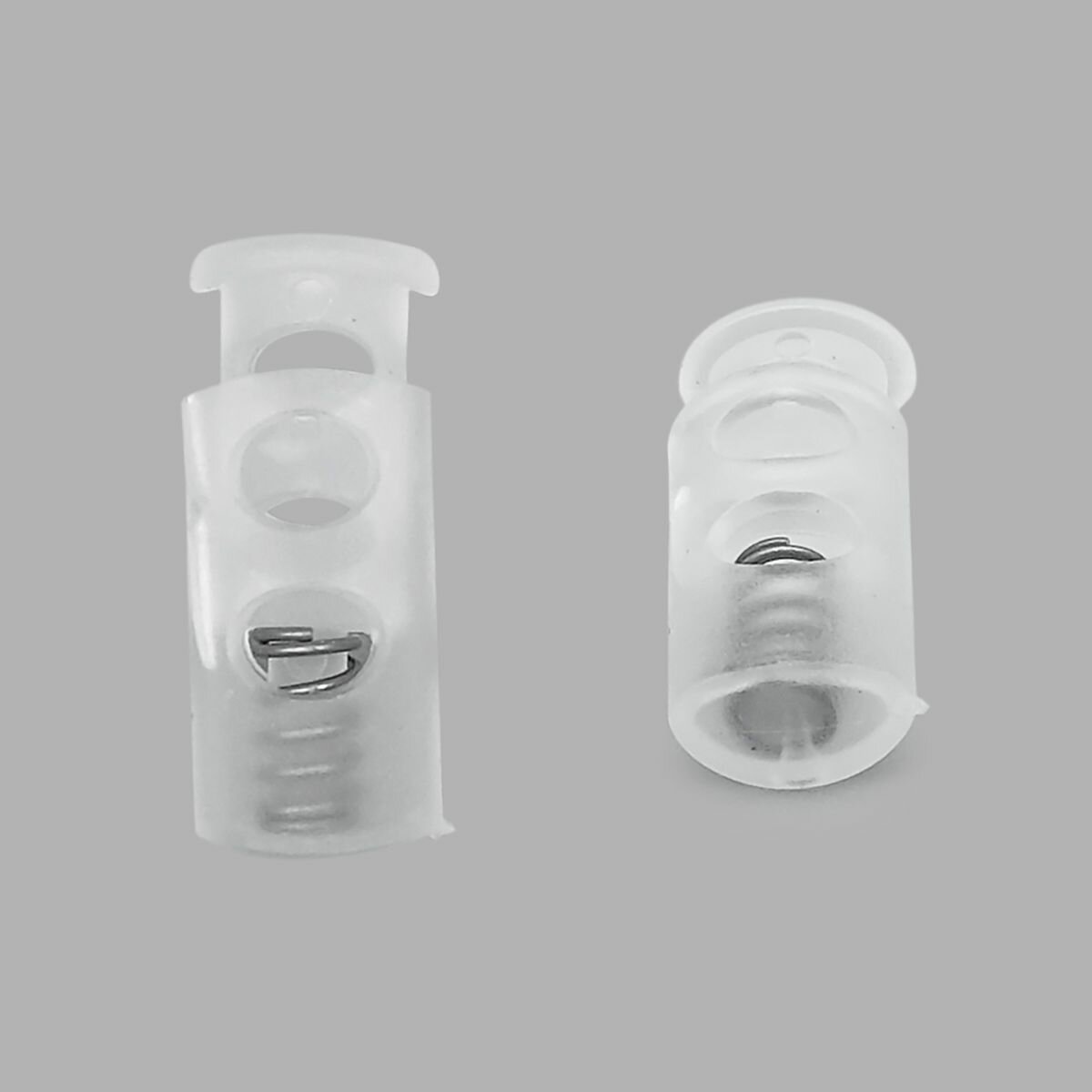 27005-СС Фиксатор (стопор) 'Цилиндр' 2 отв. d 4мм, 9*22мм, ПП (прозрачный)