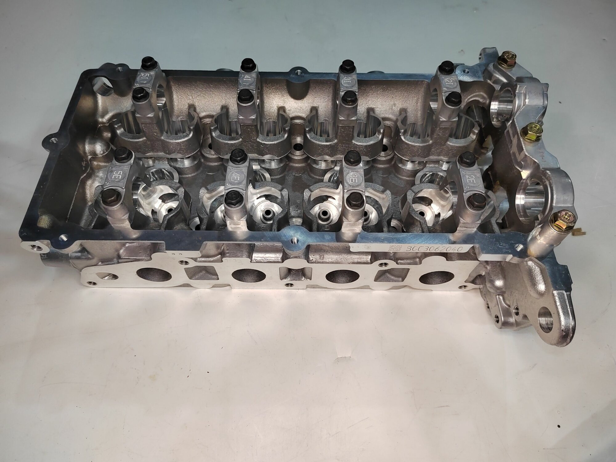 Головка блока цилиндров голая JAC Tagaz C10 [1.3 16V 5MT седан] 1003101GG010