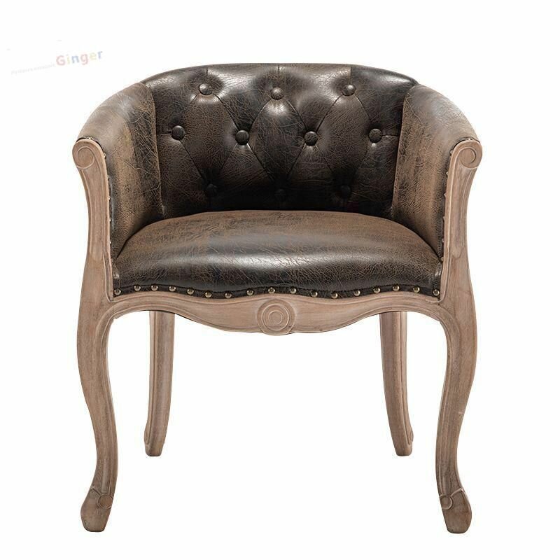 Кресло из массива дерева, обтянутое высококачественной кожаной тканью