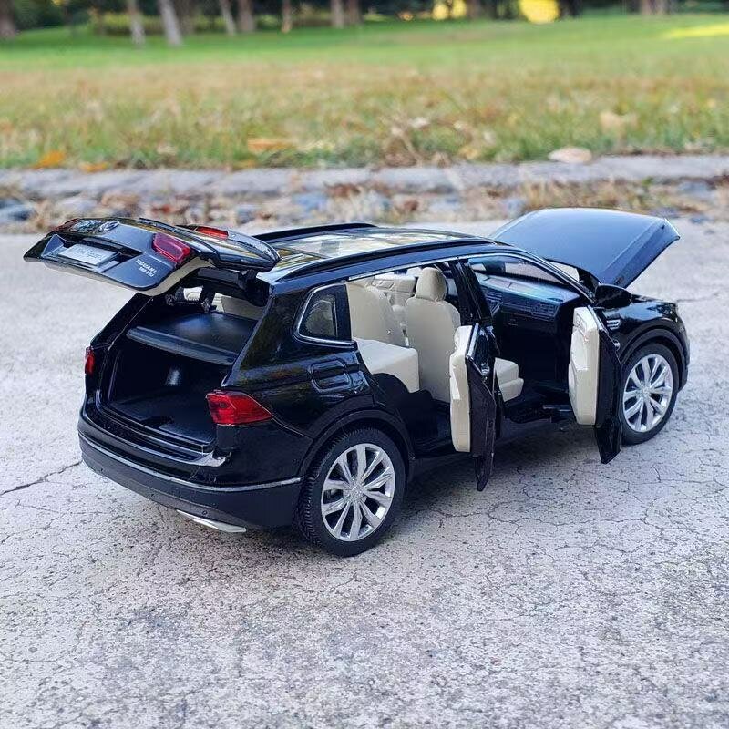Вот подробное описание модели автомобиля Volkswagen Tiguan в масштабе 1:32 — фото 1