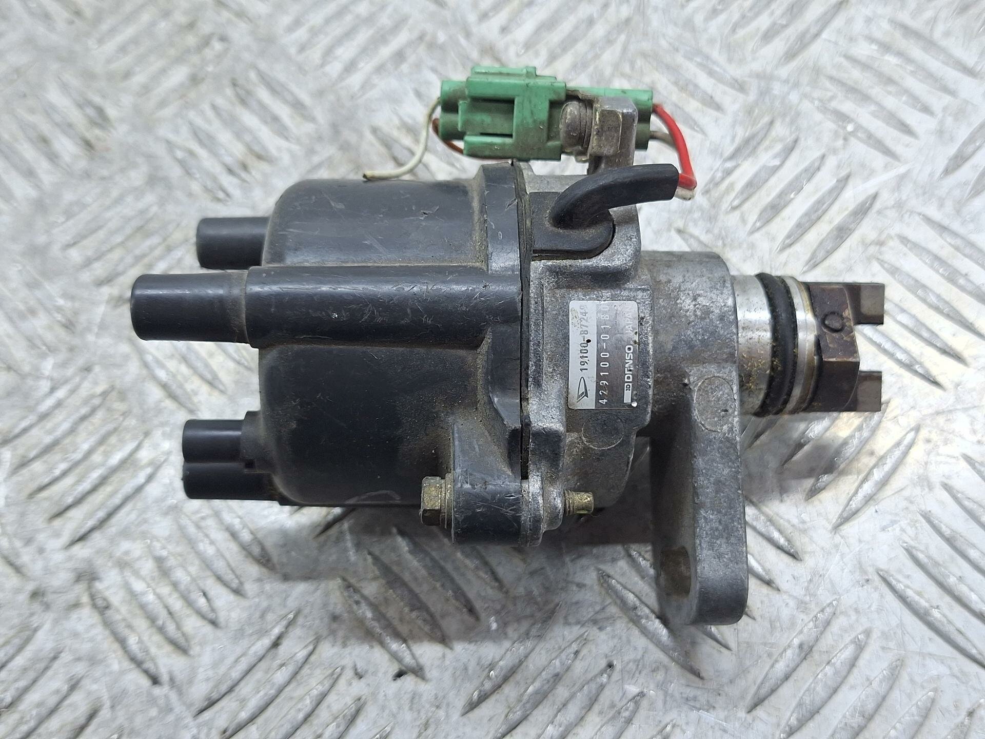 Распределитель зажигания (трамблер) Daihatsu Sirion M100 рест. 2004 1910087249