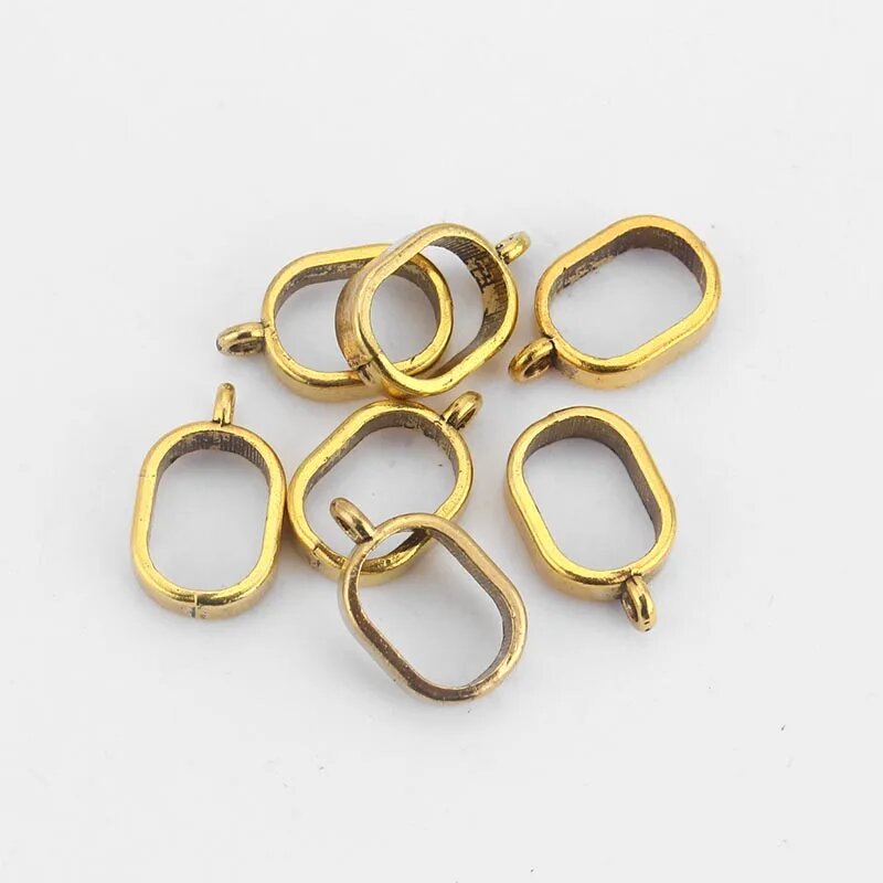 Плоские металлические бусины SunMoon 10x6 мм 20 шт antique gold color
