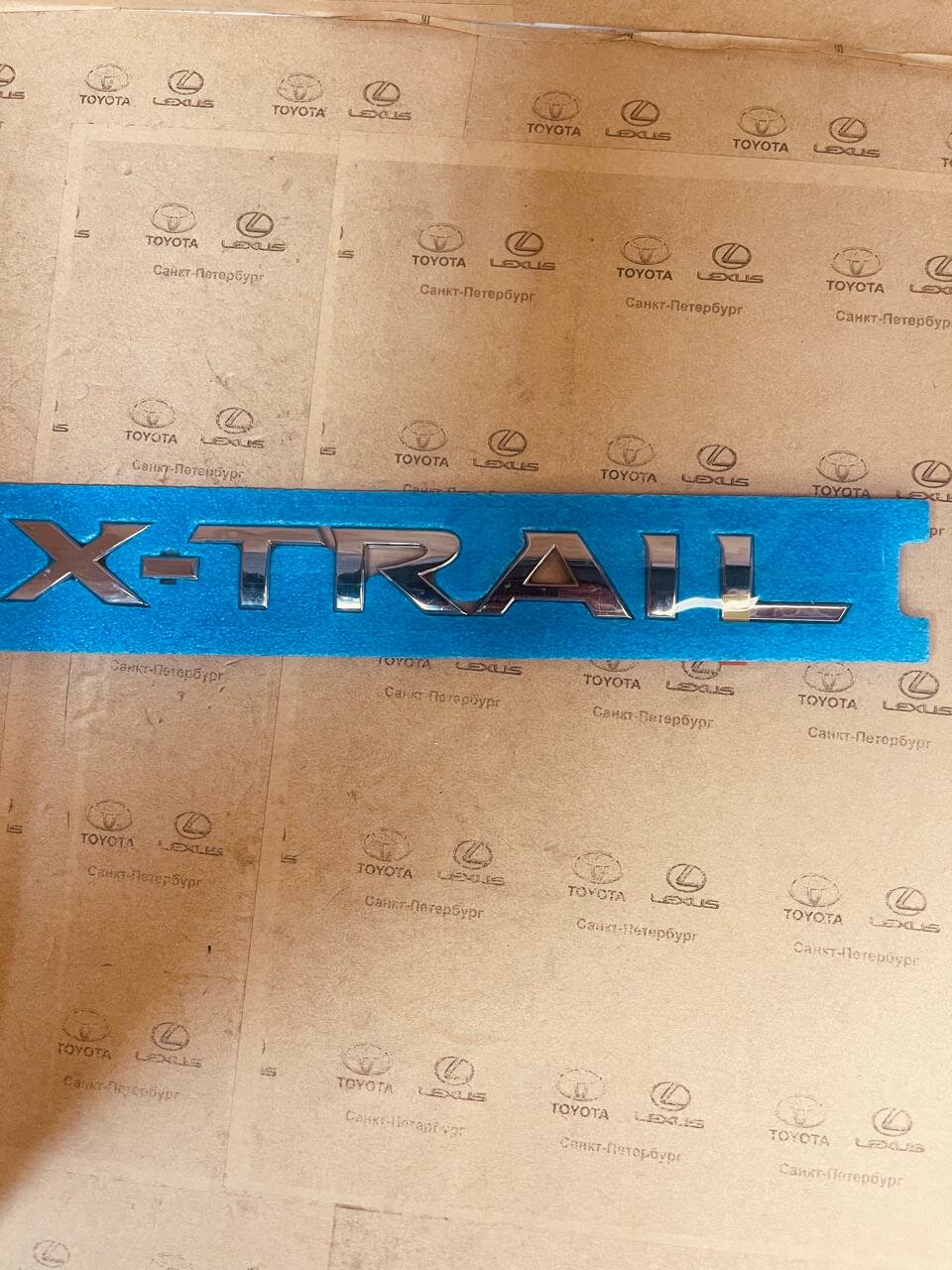 84895ES50A Надпись значок крышки багажника Nissan X-Trail