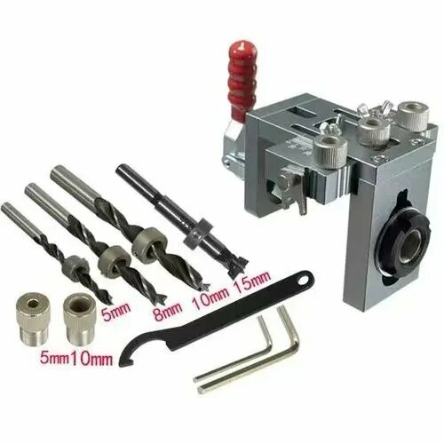 Кондуктор для сверления отверстий при сборке мебели.