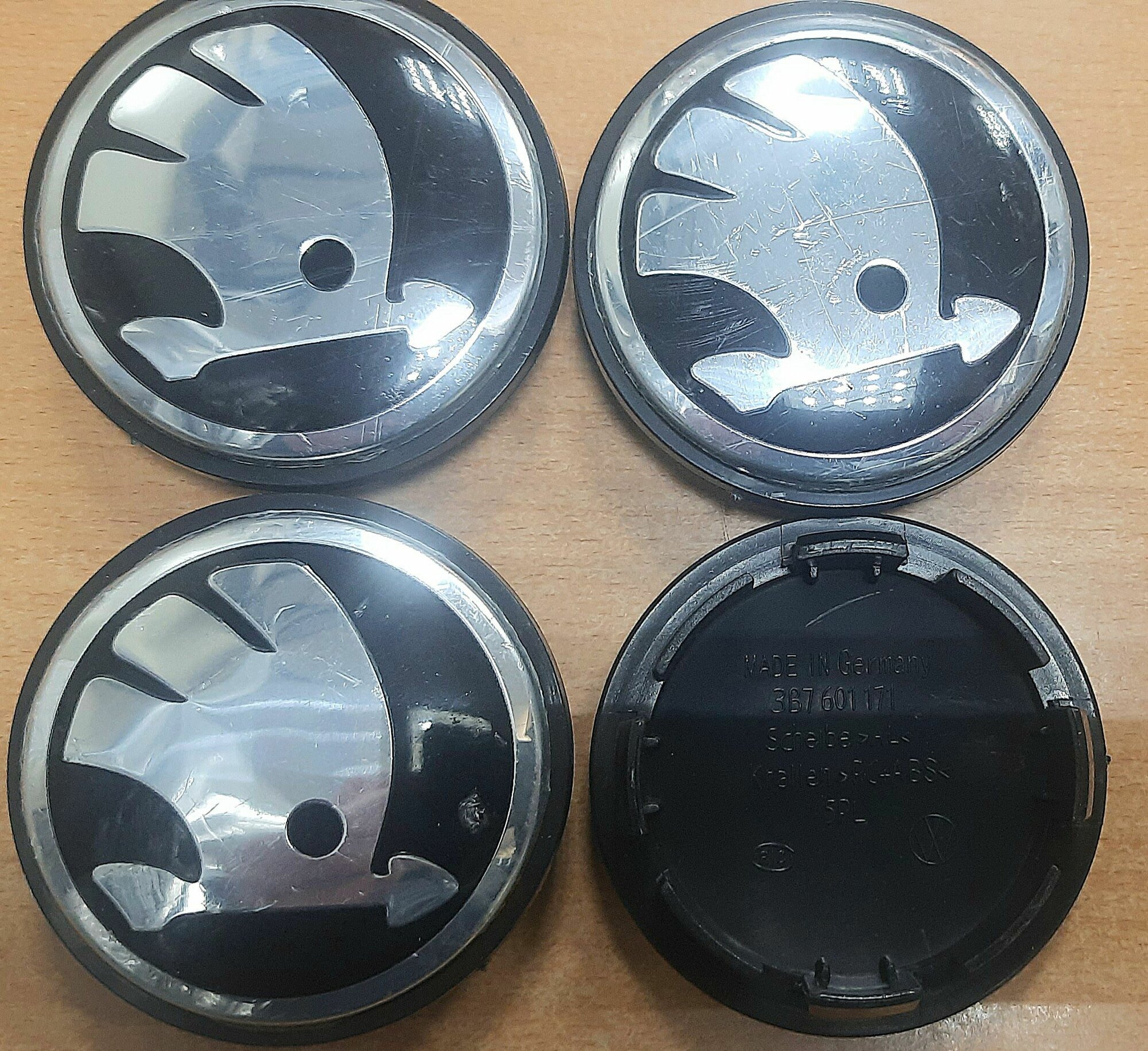 Колпачки (заглушки) на литые диски Skoda d56/52мм черные комплект 4шт