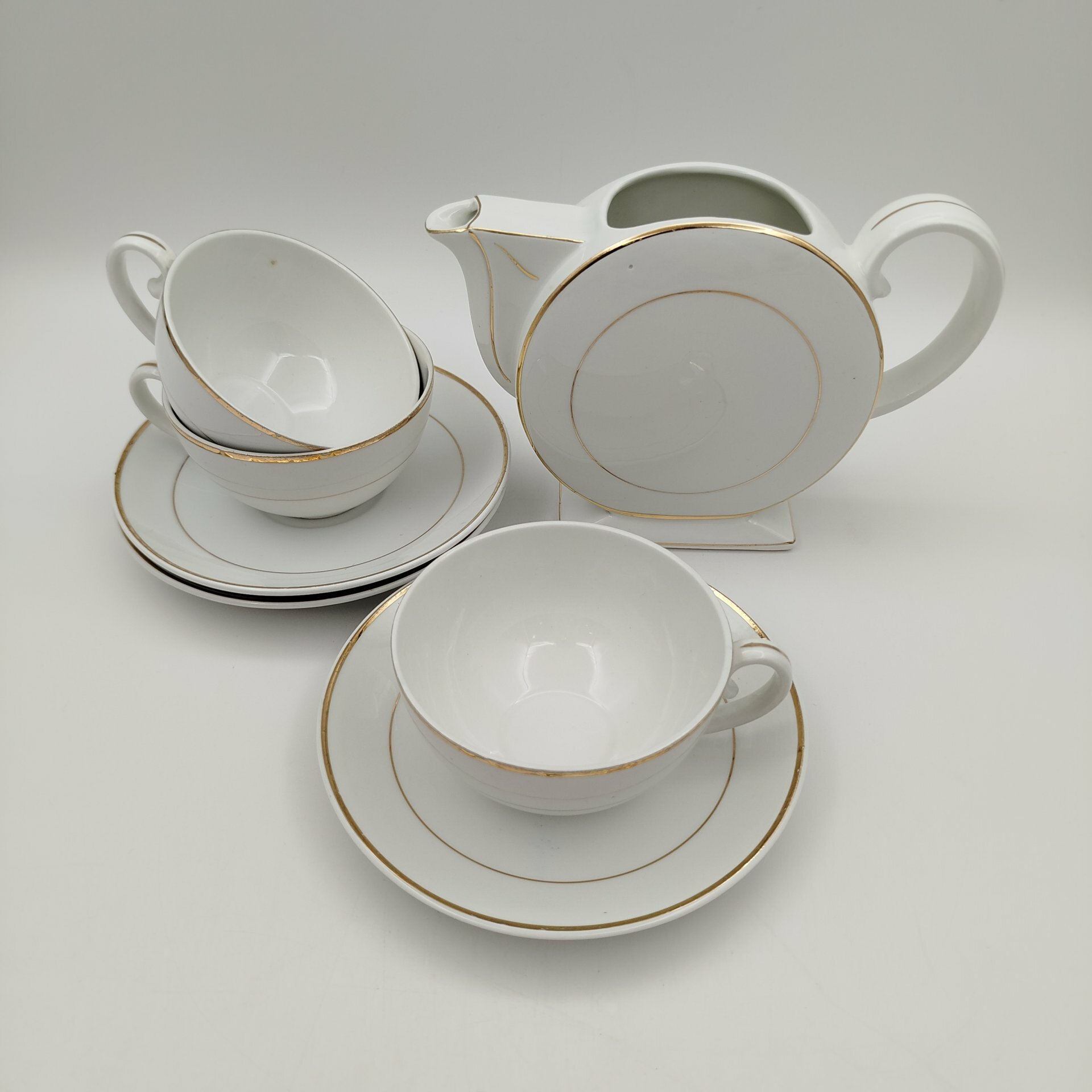 Набор чайно-кофейной посуды из молочника и пар "пузатой" формы, фаянс, золочение