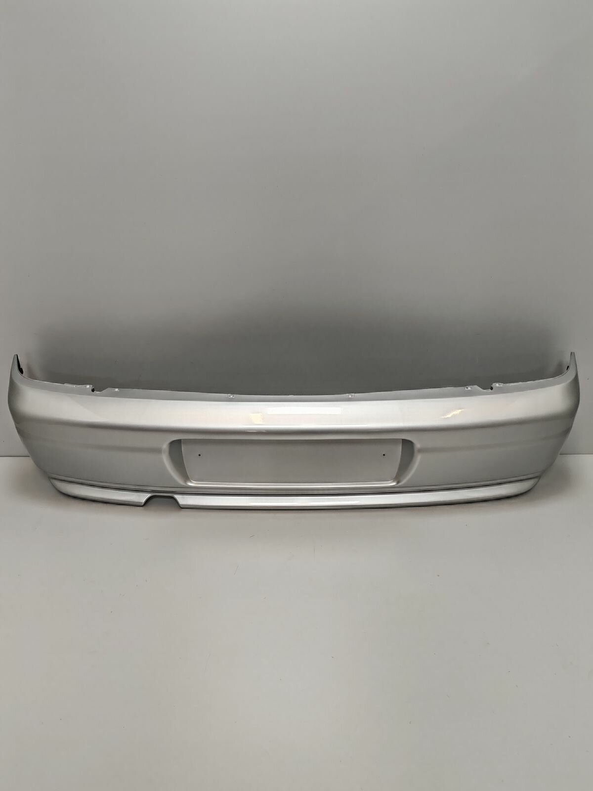 Бампер задний в цвет для ВАЗ 2112 1997 - 2009 г. 690 - снежная королева, серебристый