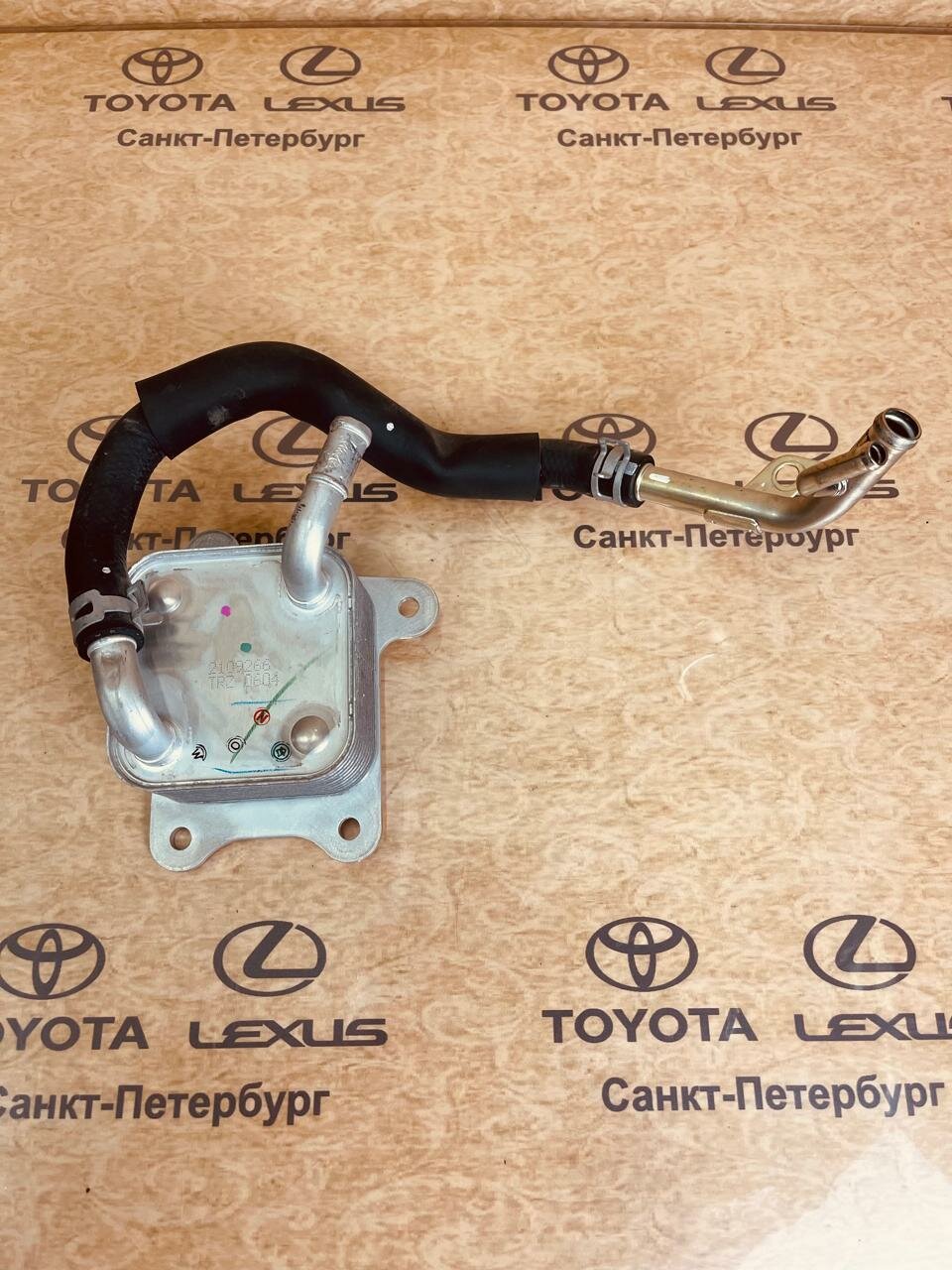 1240A100 Маслоохладитель радиатор масляный Pajero Sport 3 L200