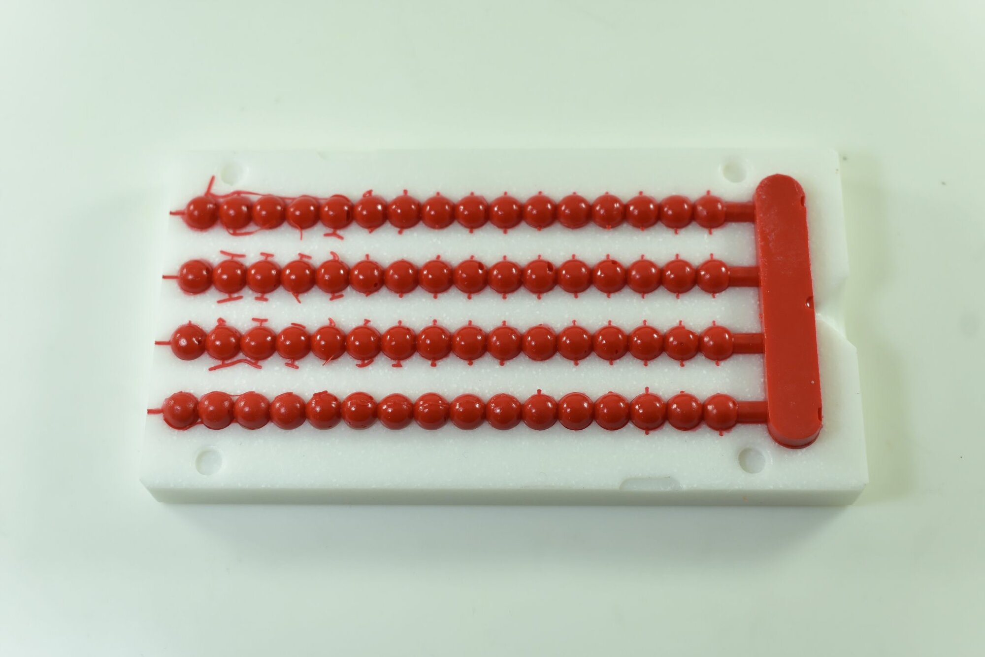 Форма для литья силиконовых приманок Сфера 7 мм х 64 места