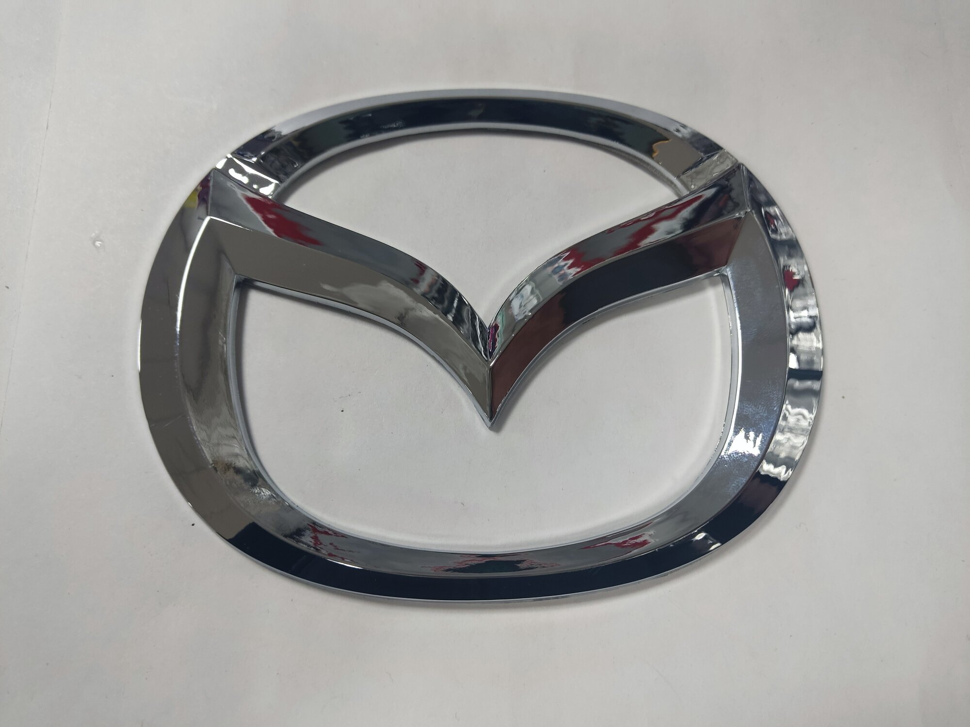 Эмблема Mazda, самоклеящаяся, 14х11.2 см, хромированная поверхность