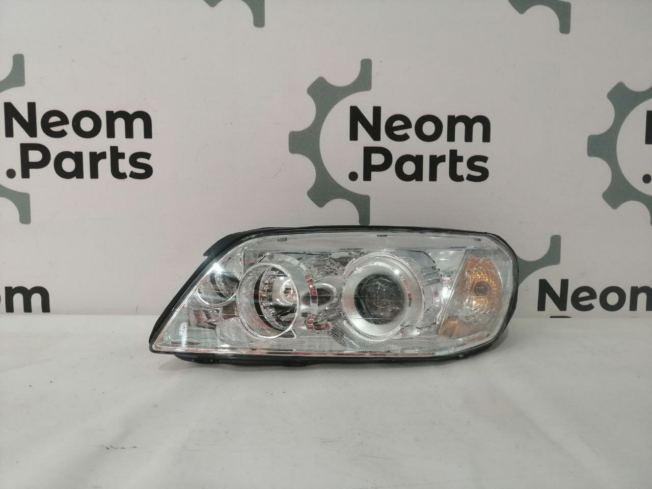 Фара левая Chevrolet Captiva C100 06-12