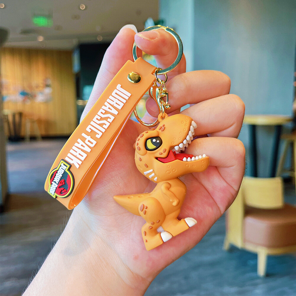 Брелок с динозавром из мультфильма «Парк Юрского периода», брелок для ключей от машины, сувенир, подвеска для рюкзака, желтый брелок с динозавром.