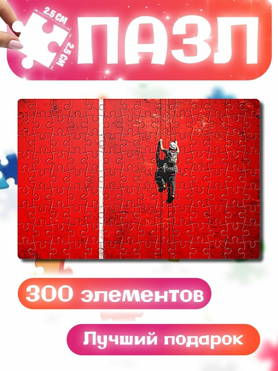 Пазлы для детей и взрослых Отвесная красная скала с альпинистом