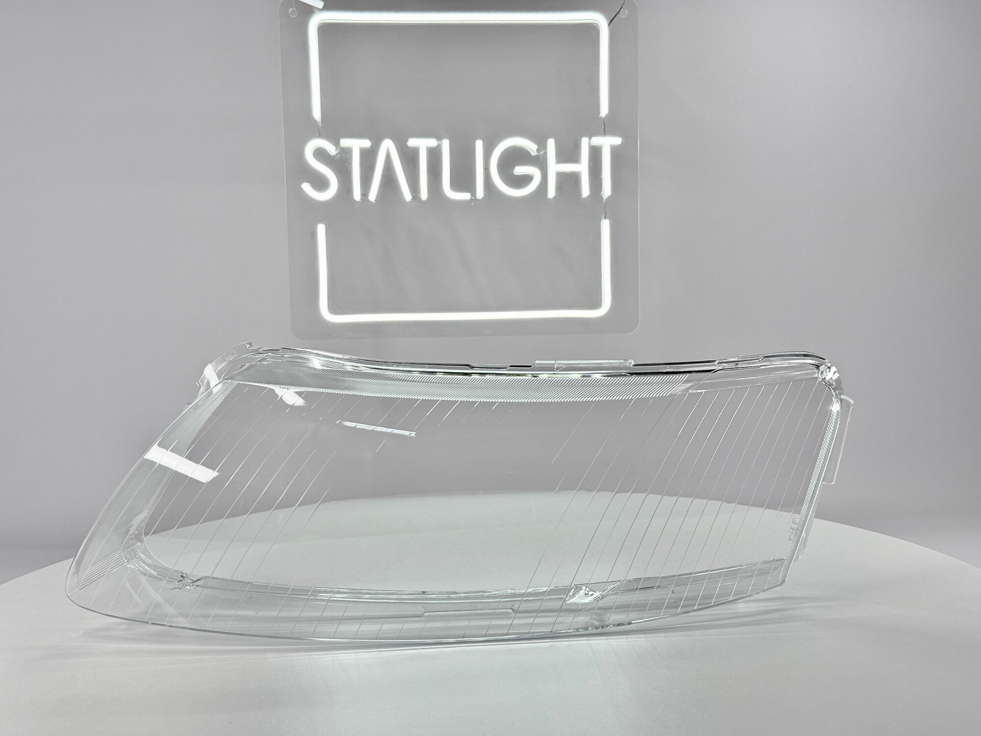 Левое стекло фары Audi A6 III (C6) 2004-2011