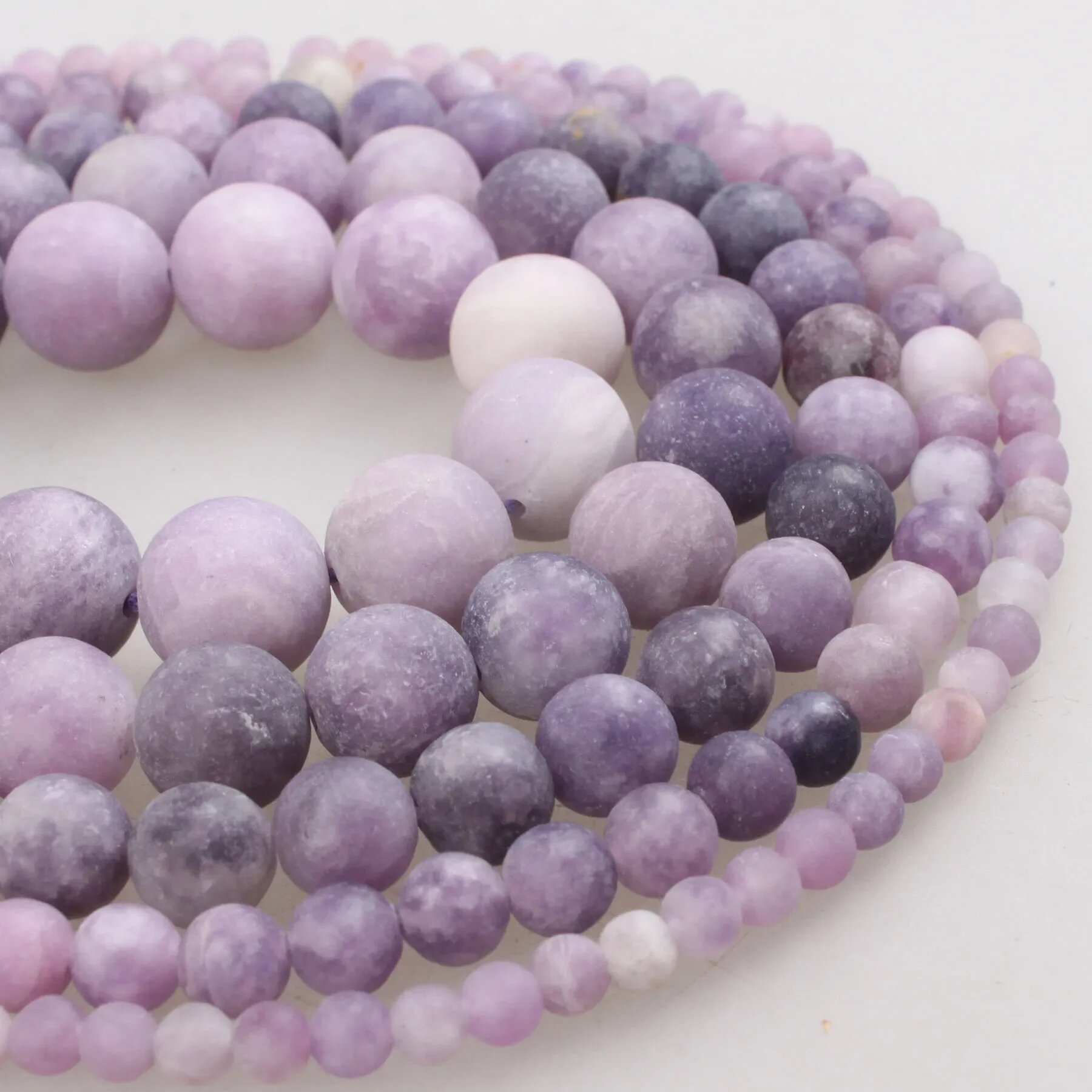 Фиолетовые бусины из лепидолита 4-12 мм 8mm around 46beads, Matted