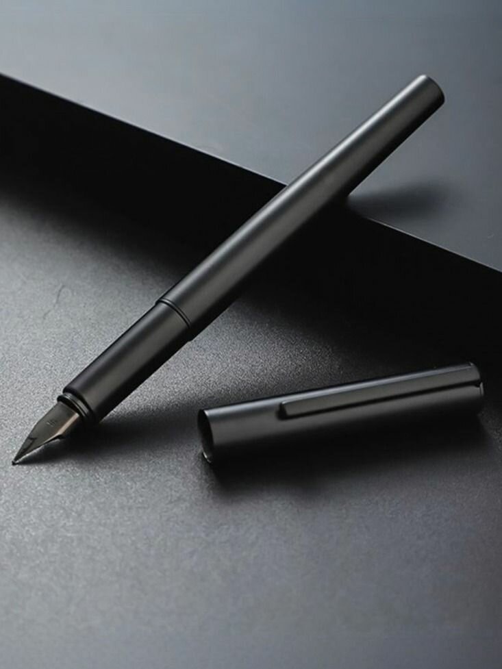 Перьевая ручка 35 корпус нержавеющая сталь. Китай. Перо EF (0.38 мм). Заправка поршнем. Цвет черный