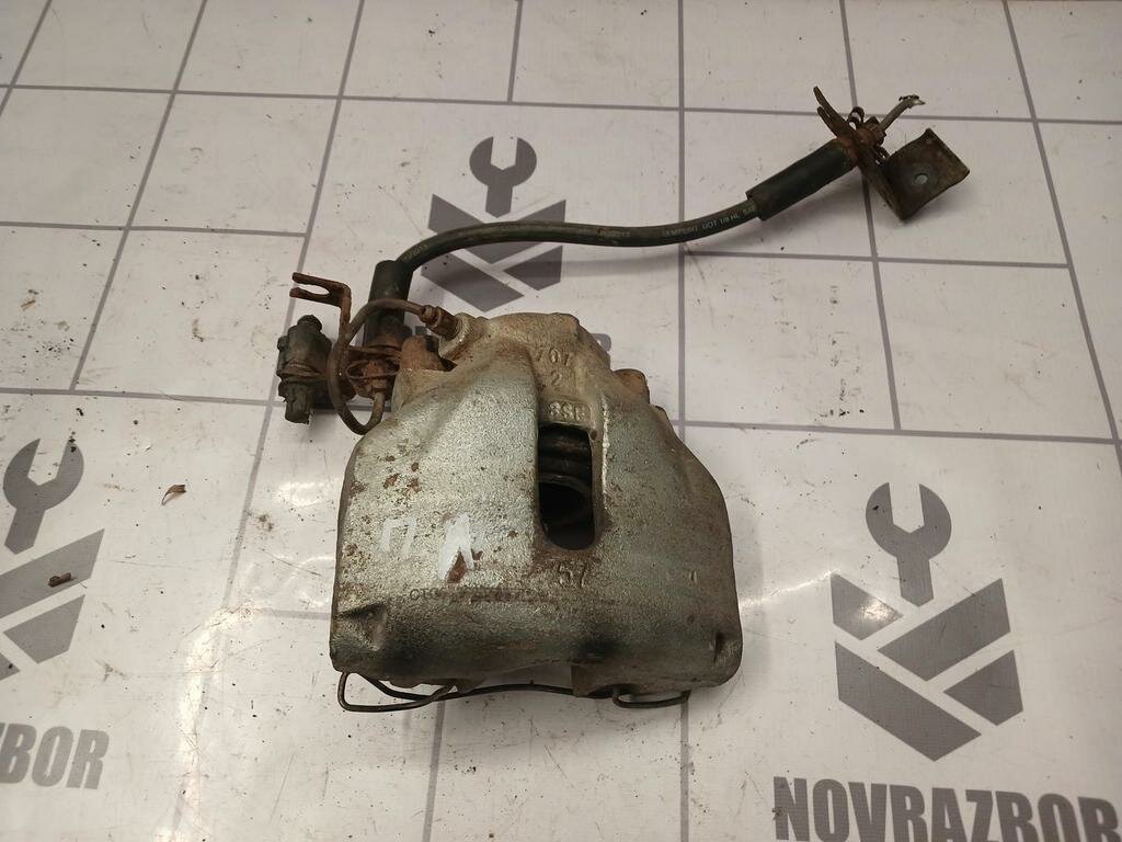 Суппорт передний левый VW Passat B5 96-00