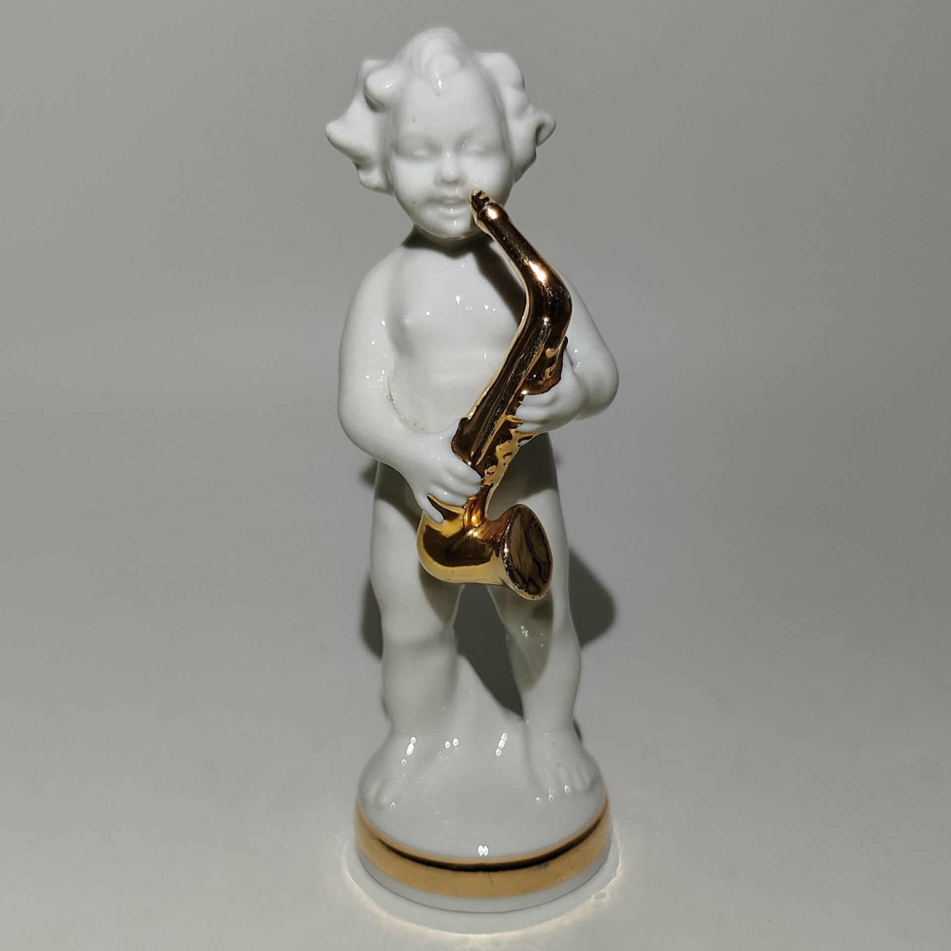 Статуэтка "Путти, играющий на саксофоне", фарфор, золочение, Gräfenthal (Графенталь)