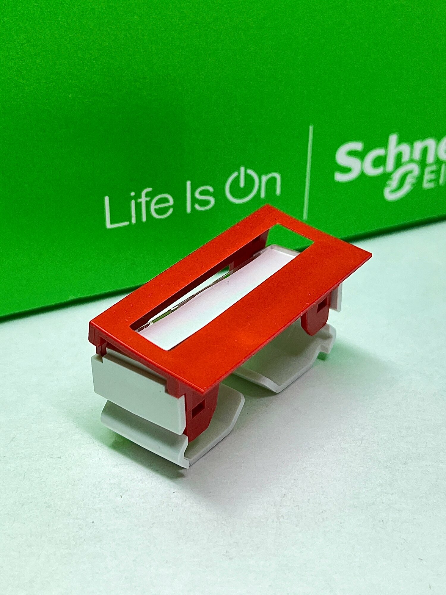 Schneider Electric Unica System+ Держатель этикетки красный ISM10923
