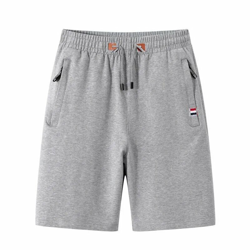 Мужские спортивные шорты, серые, сdrawstring и карманами на молнии, для отдыха и спорта — фото 1