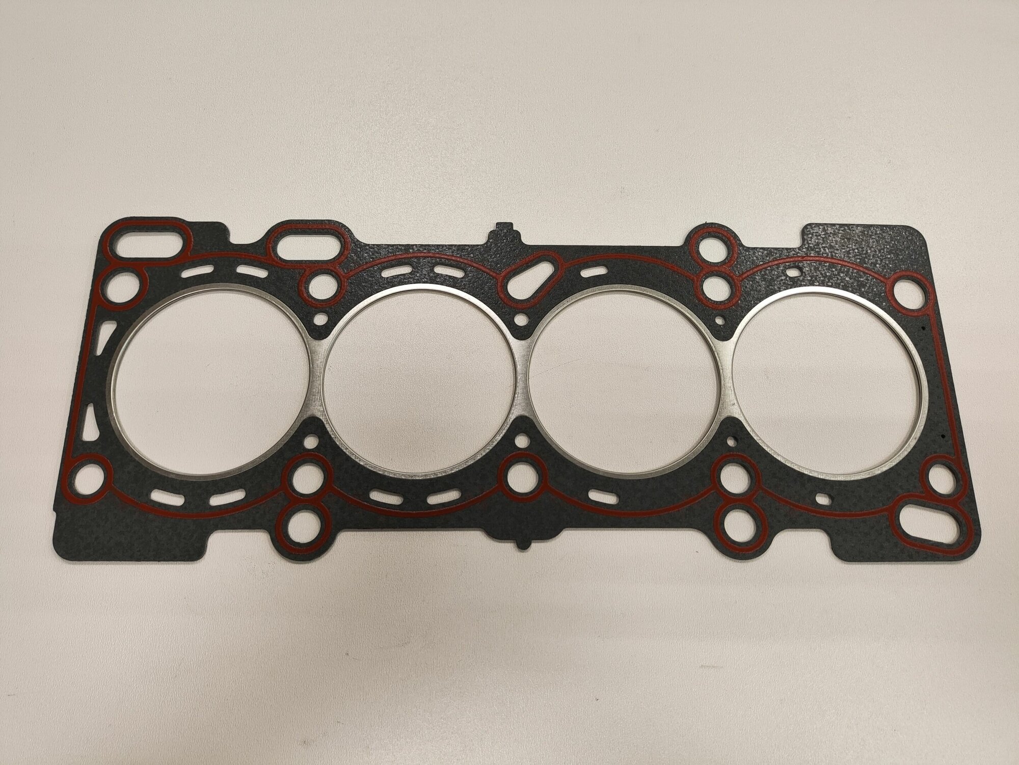 Прокладка ГБЦ (паронит) SAT Haima 3 [1.8 16V 5MT хетчбэк]