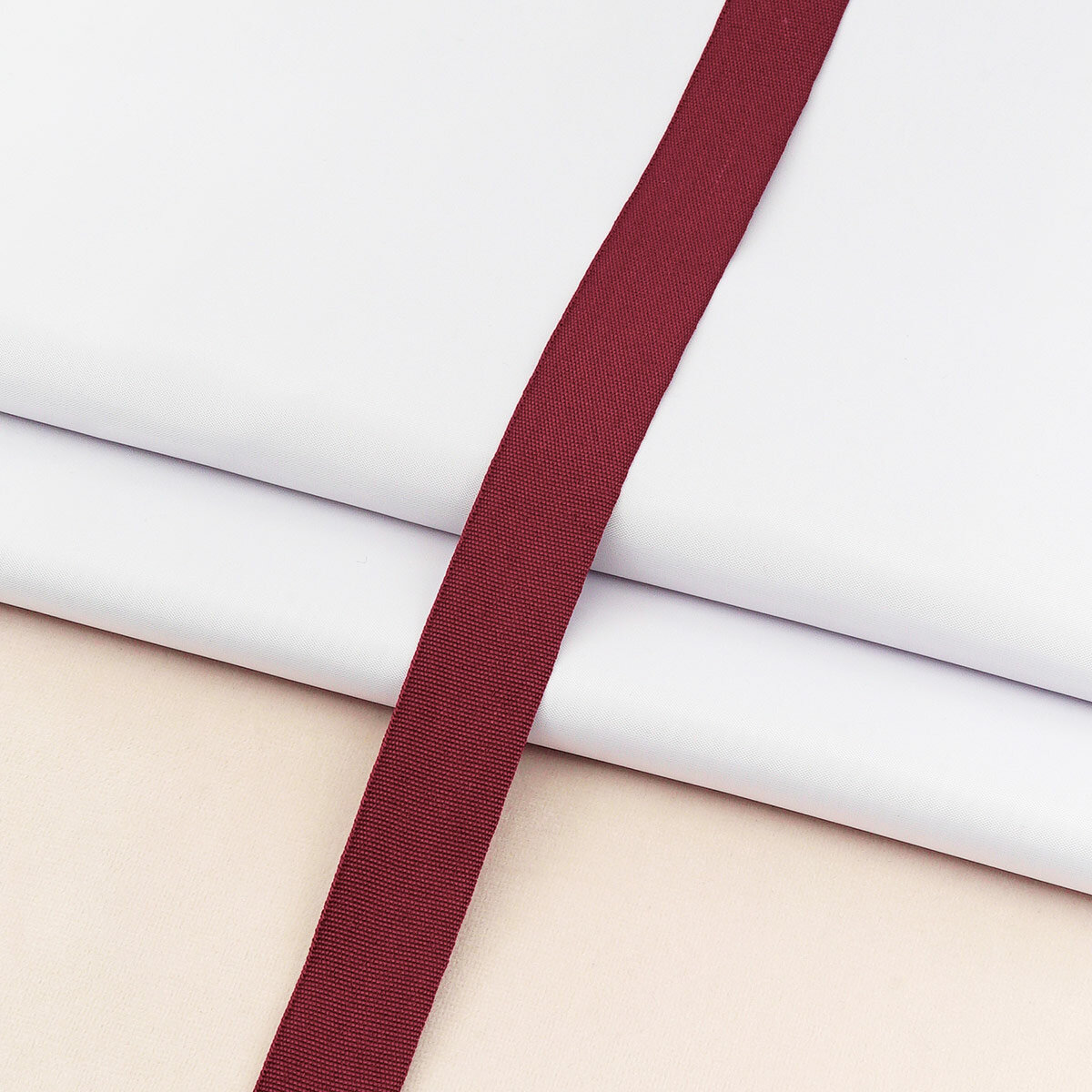 Тесьма окантовочная 4,5 г/м (100% полиэстер), 22 мм*100 м (34 темно-красный)