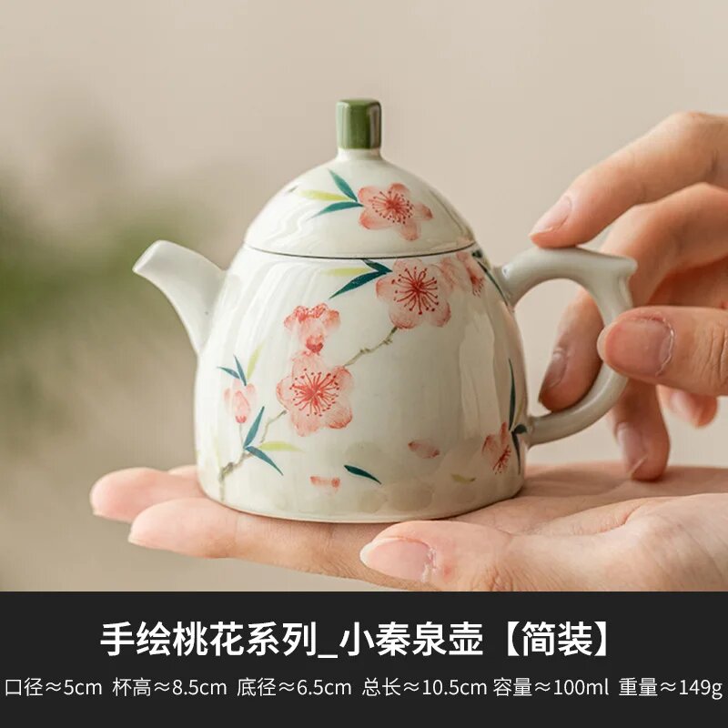 Керамический чайник с цветком персика