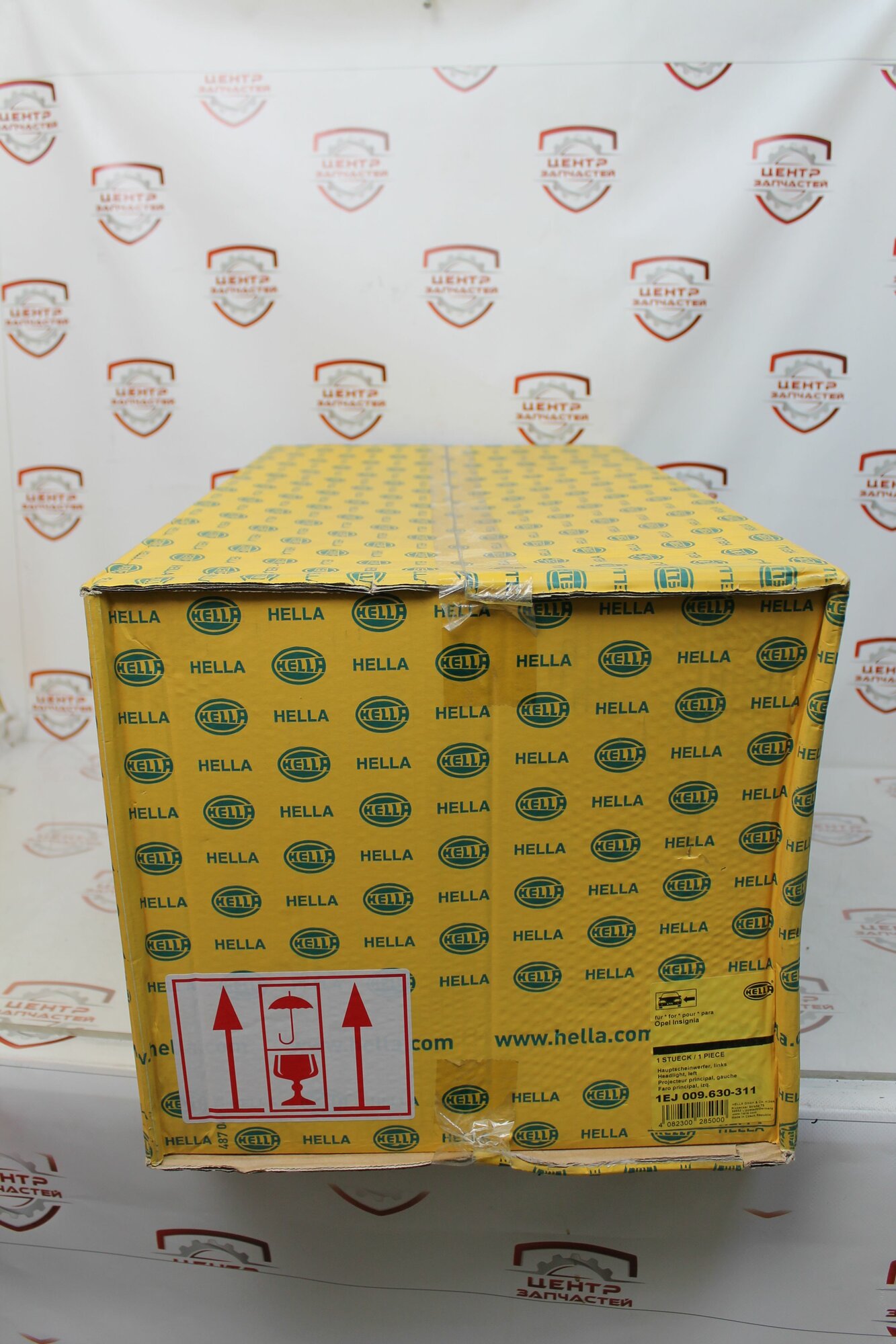 Фара левая HELLA 1EJ009630311