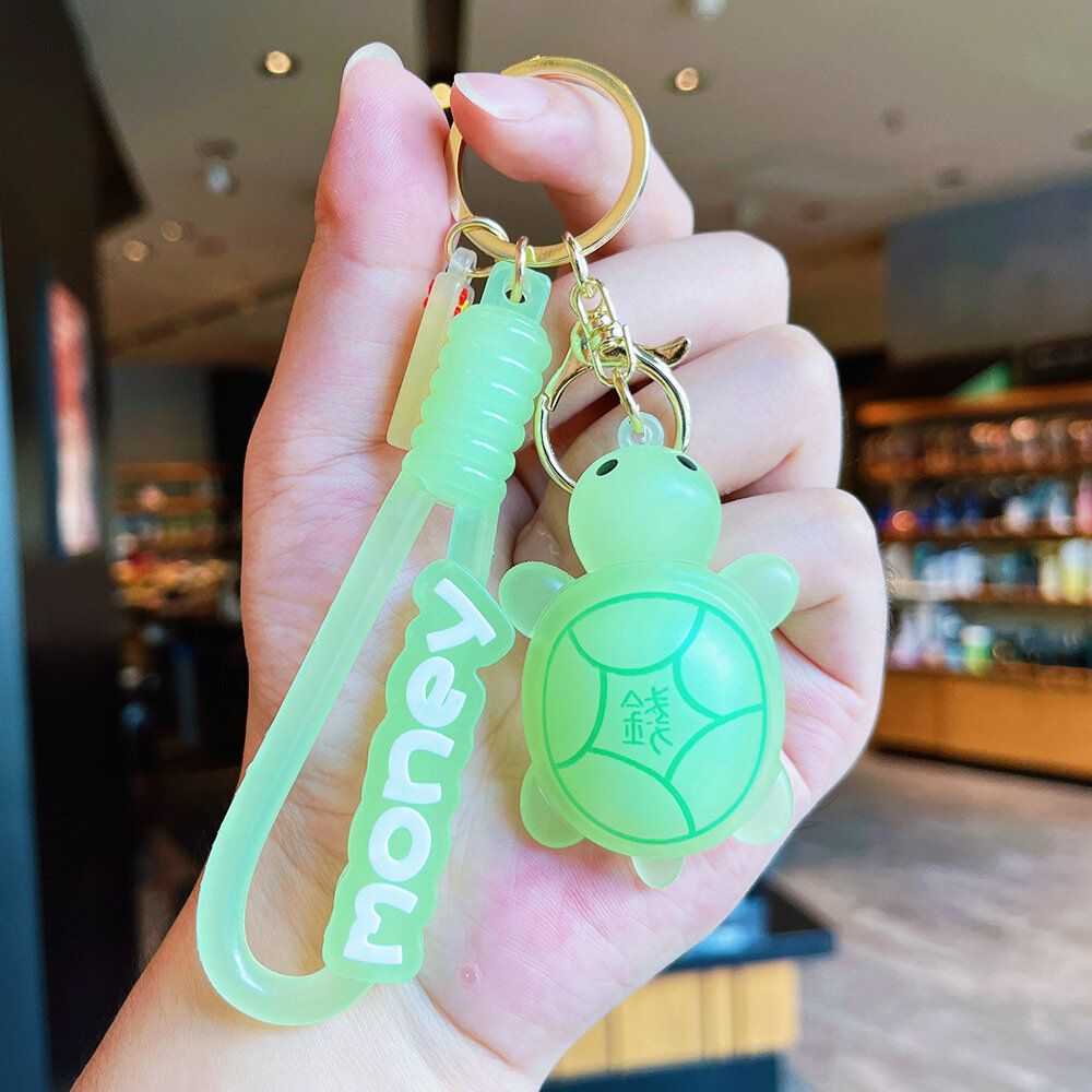 Брелок в виде светящейся в темноте черепашки, черепашка в непрозрачном пакетике, подвеска для сумки на машину, кулон в виде светящейся в темноте черепашки зеленого цвета