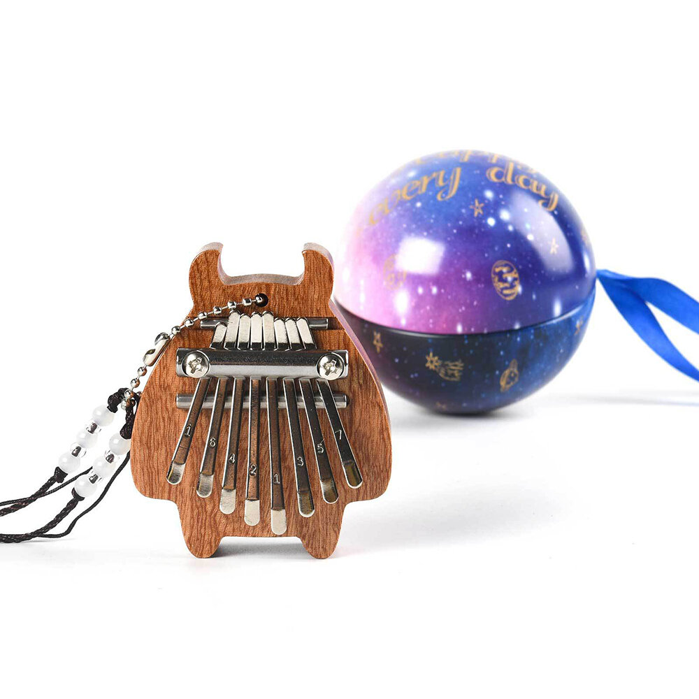 8-Key Mini Kalimba Portable Thumb Finger Piano Percussion Pocket Musical Instrument with Necklace, Material: Wood+Metal, Item Size: 75*60*18mm/2.95*2.36*0.71in, Ball Diameter: 80mm/3.15in, Package Weight: 162g/5.71ounces, Package Size: