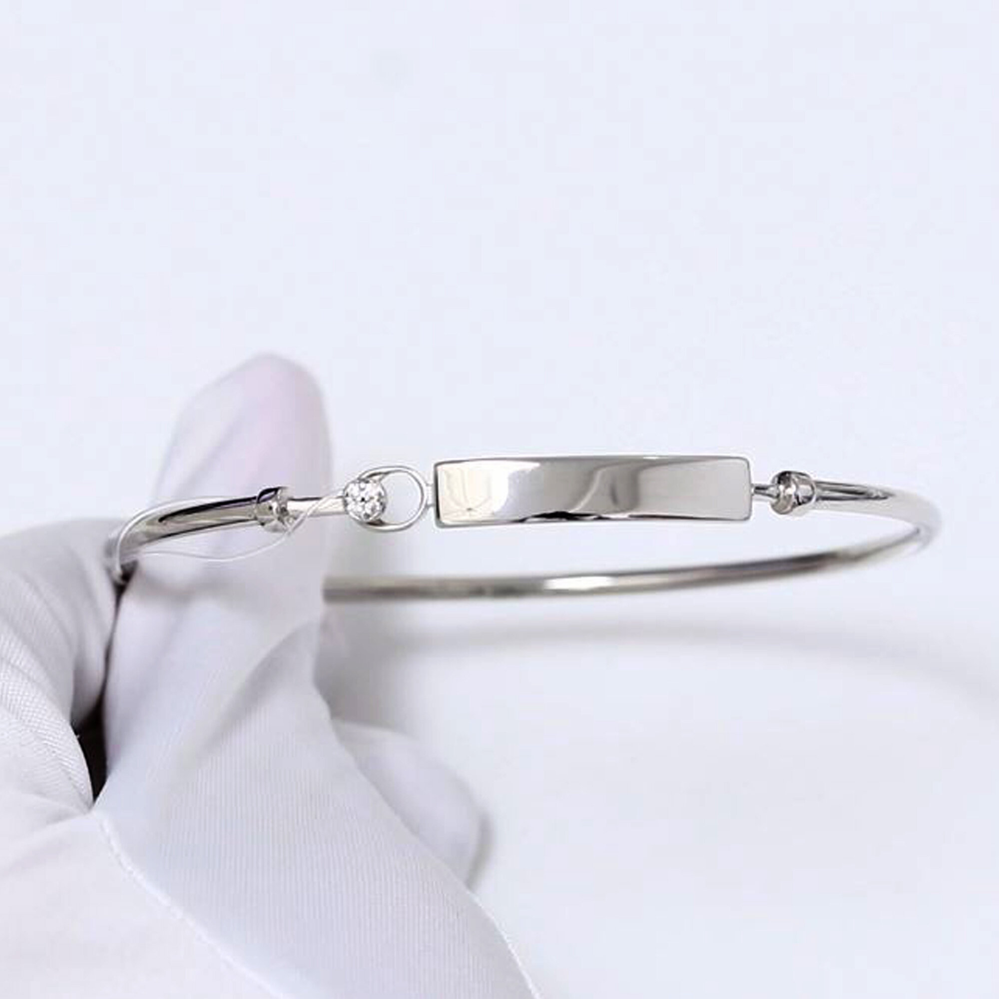 Жесткий браслет, серебро, 925 проба, родирование, фианит