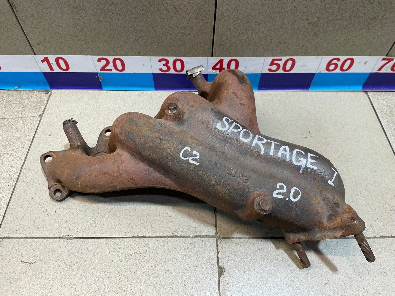 Коллектор выпускной Kia Sportage I (1993—2006) 0K90013450B