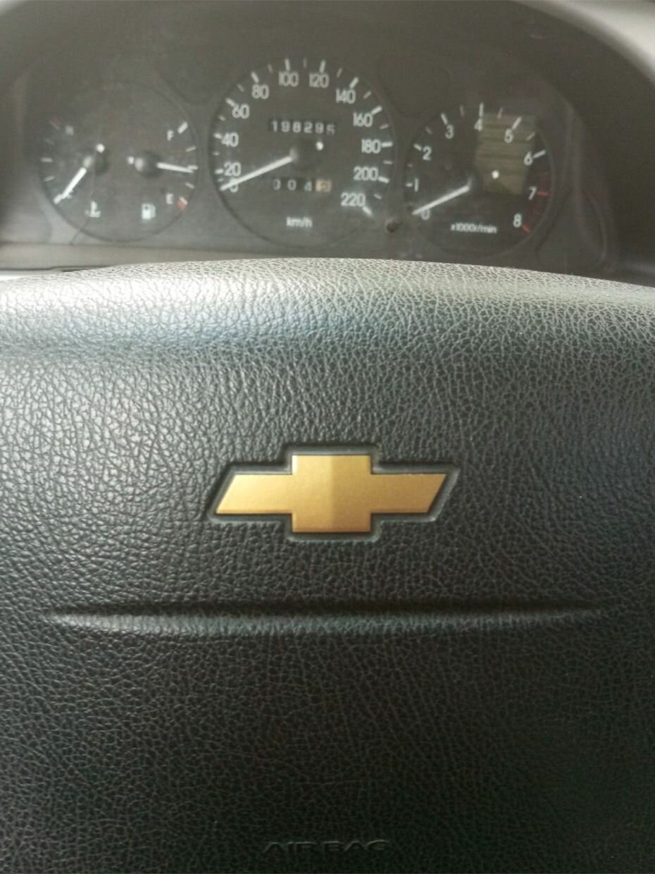 Наклейка "Эмблема на руль Chevrolet Lanos", после 2005 г, золотисто-медный