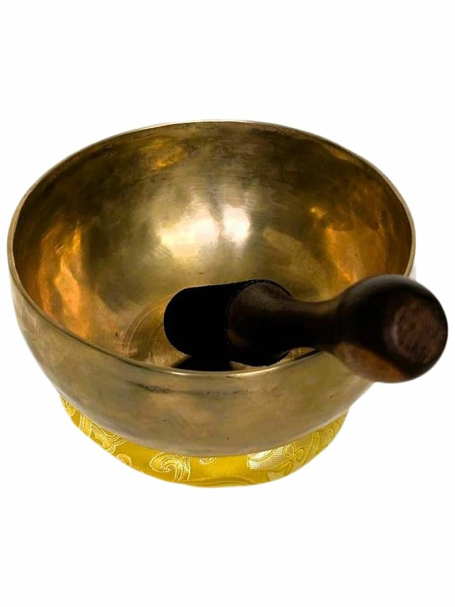 Тибетская тонкостенная поющая чаша (кованая) : диаметр 18.52см, ноты Сол, частота вибрации:192Гц, в комплекте со стиком и подушечкой