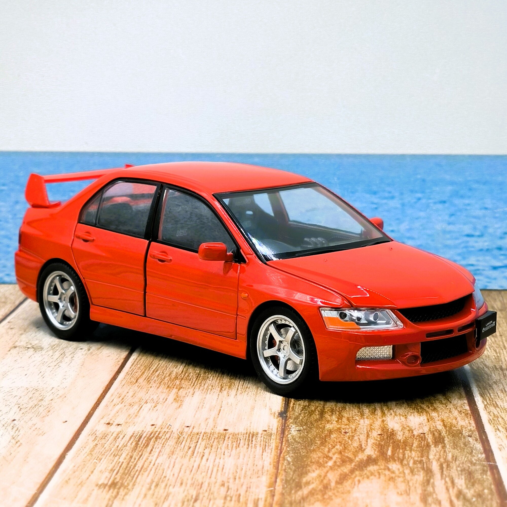 Металлическая модель автомобиля Mitsubishi Lancer Evolution Севт/Звук Масштаб 1:24