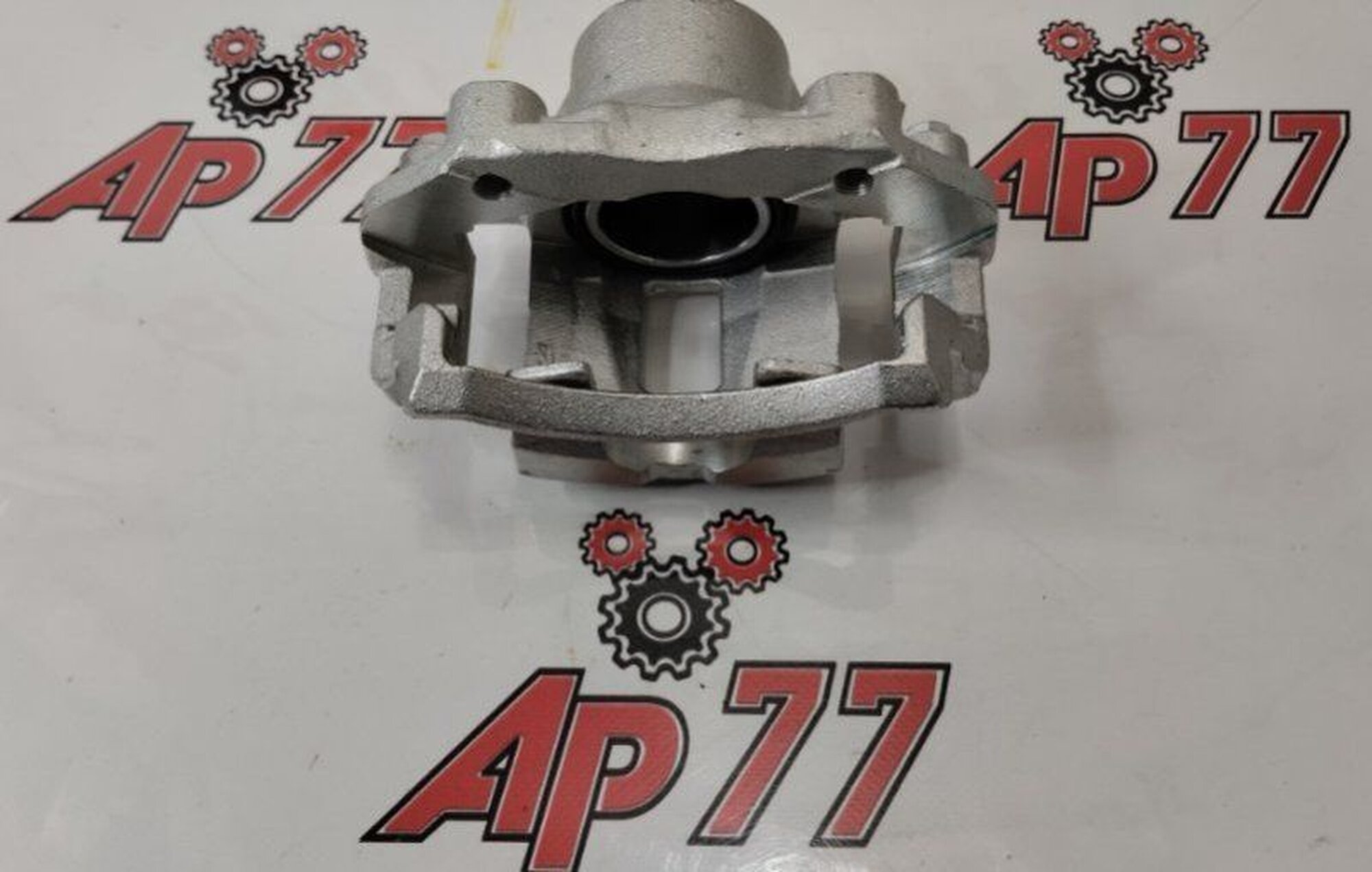 Суппорт Nissan Datsun AMD21 1поршневой FL 4101109W00 передний левый