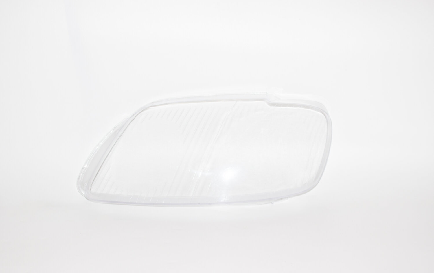 Стекло фары VOLKSWAGEN TOURAN (2003-2006) (левое)