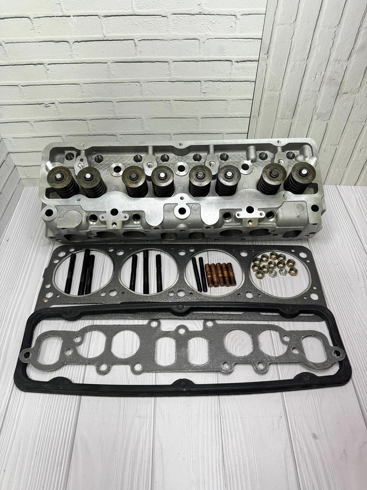 Головка блока цилиндров 3302 бизнес дв. умз-4216 ЕВРО-3, 4 в сборе с прокладками крепежом УМЗ