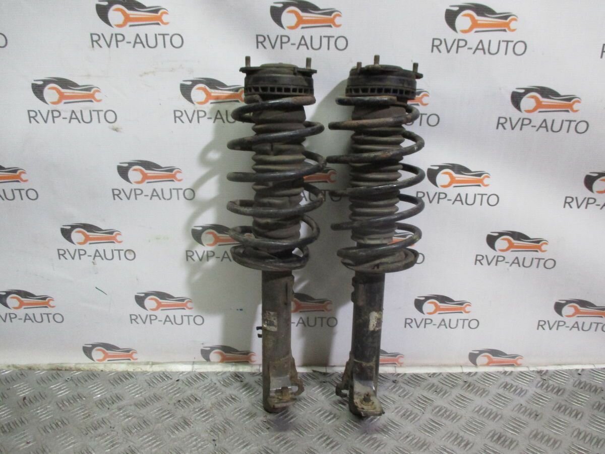 Амортизатор передний Mazda Demio DW 1996-2002 DC20-34-900