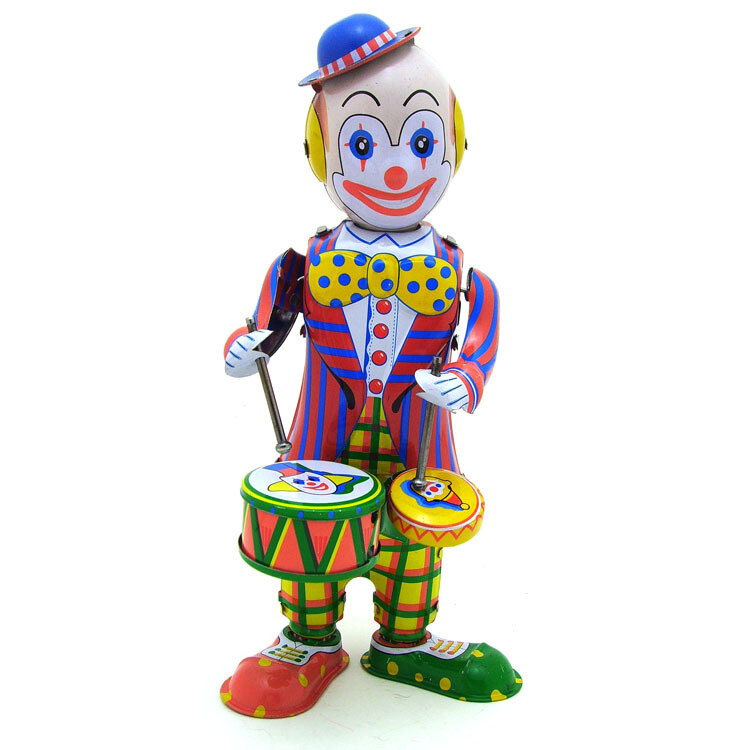 Клоун, играющий на барабанах, заводная игрушка из жести