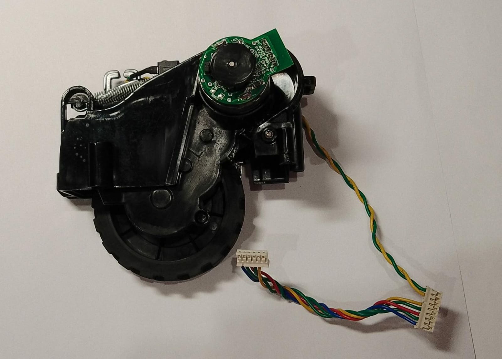 Колесо левое (L) робота пылесоса Tefal Xplorer Serie 120 AI (RG7865WH)