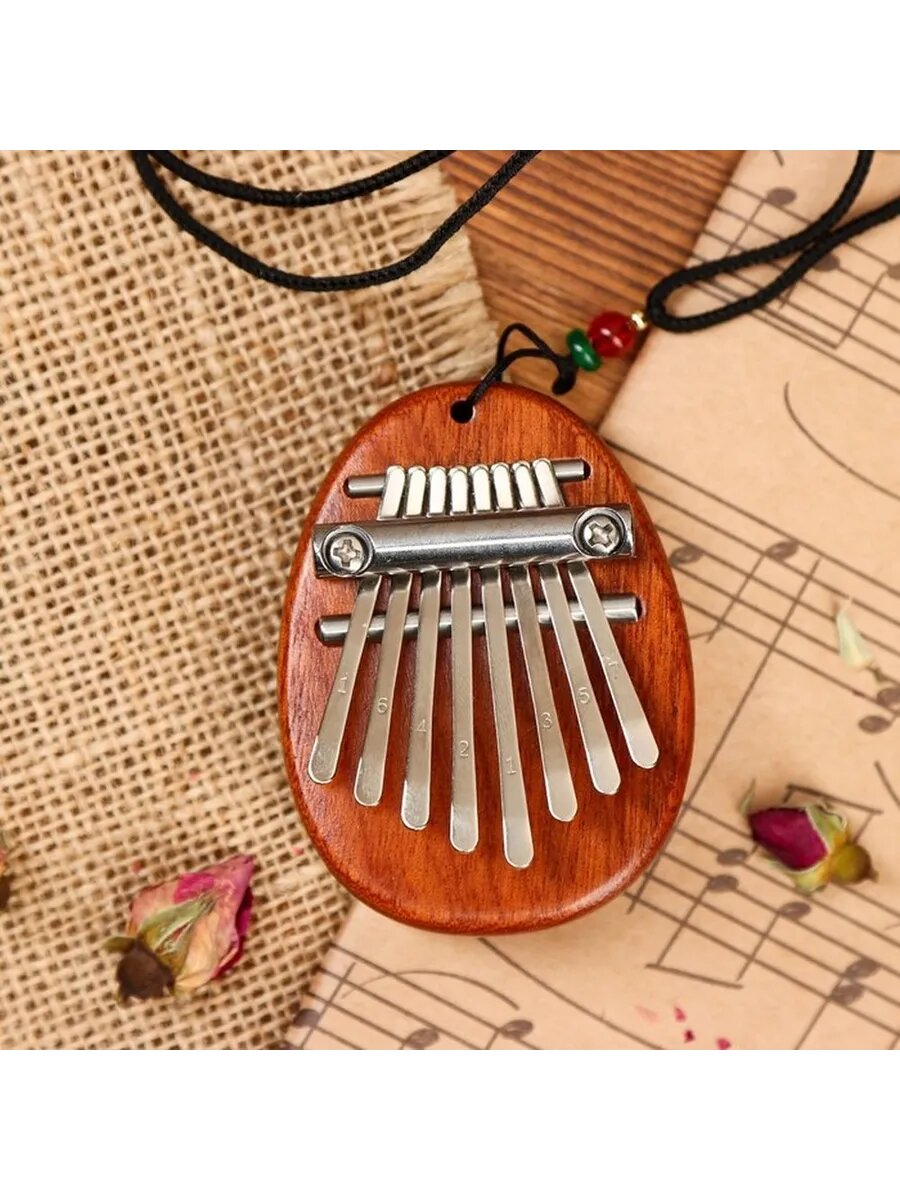Маленькая деревянная калимба с 8 язычками