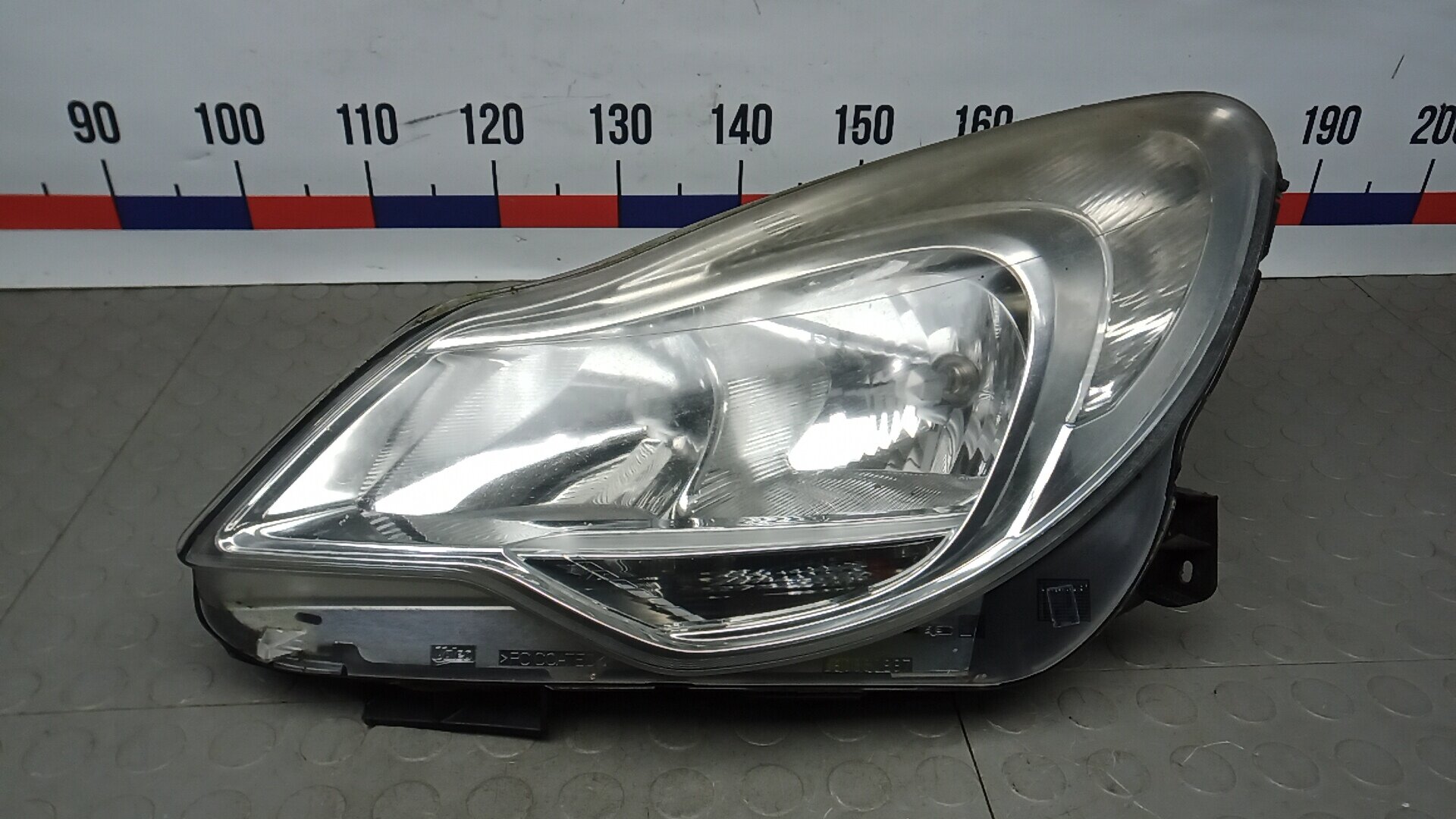 Фара левая OPEL CORSA D